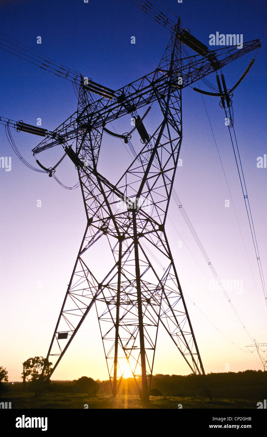 Power lines at sunset Stock Photo - Alamy