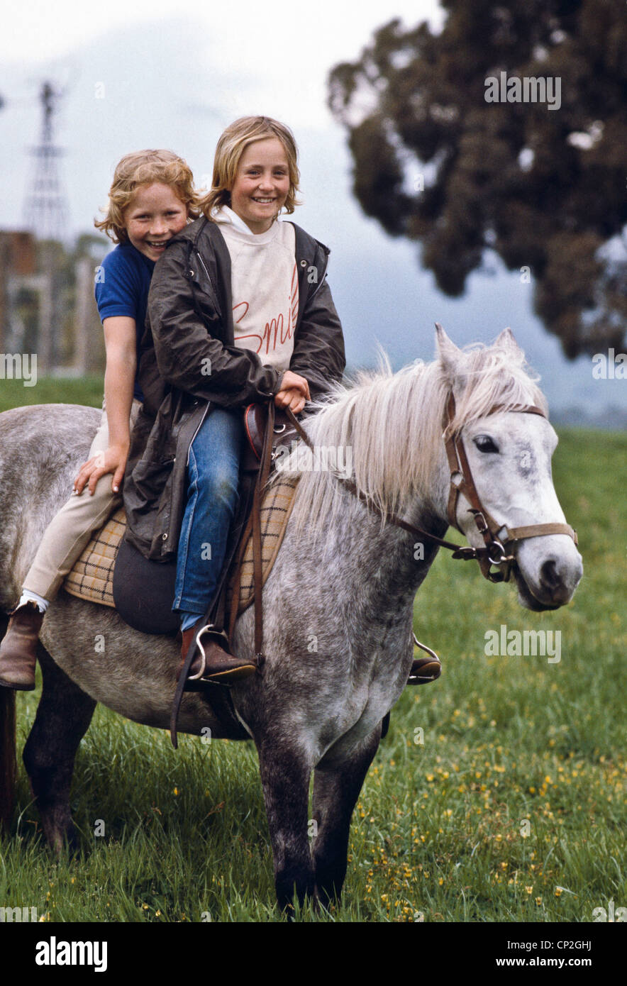 Country kids riding their ponies, Australia Stock Photo - Alamy