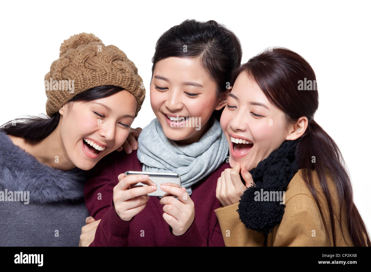 Young women using mobile phone Stock Photo - Alamy