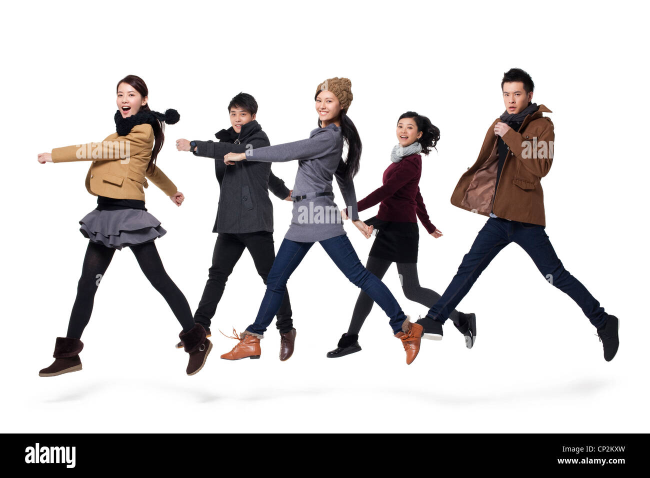 Young people walking in line Stock Photo - Alamy