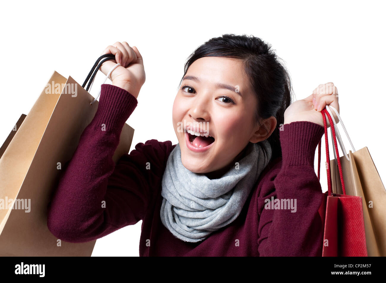 Stylish young woman going shopping Stock Photo - Alamy