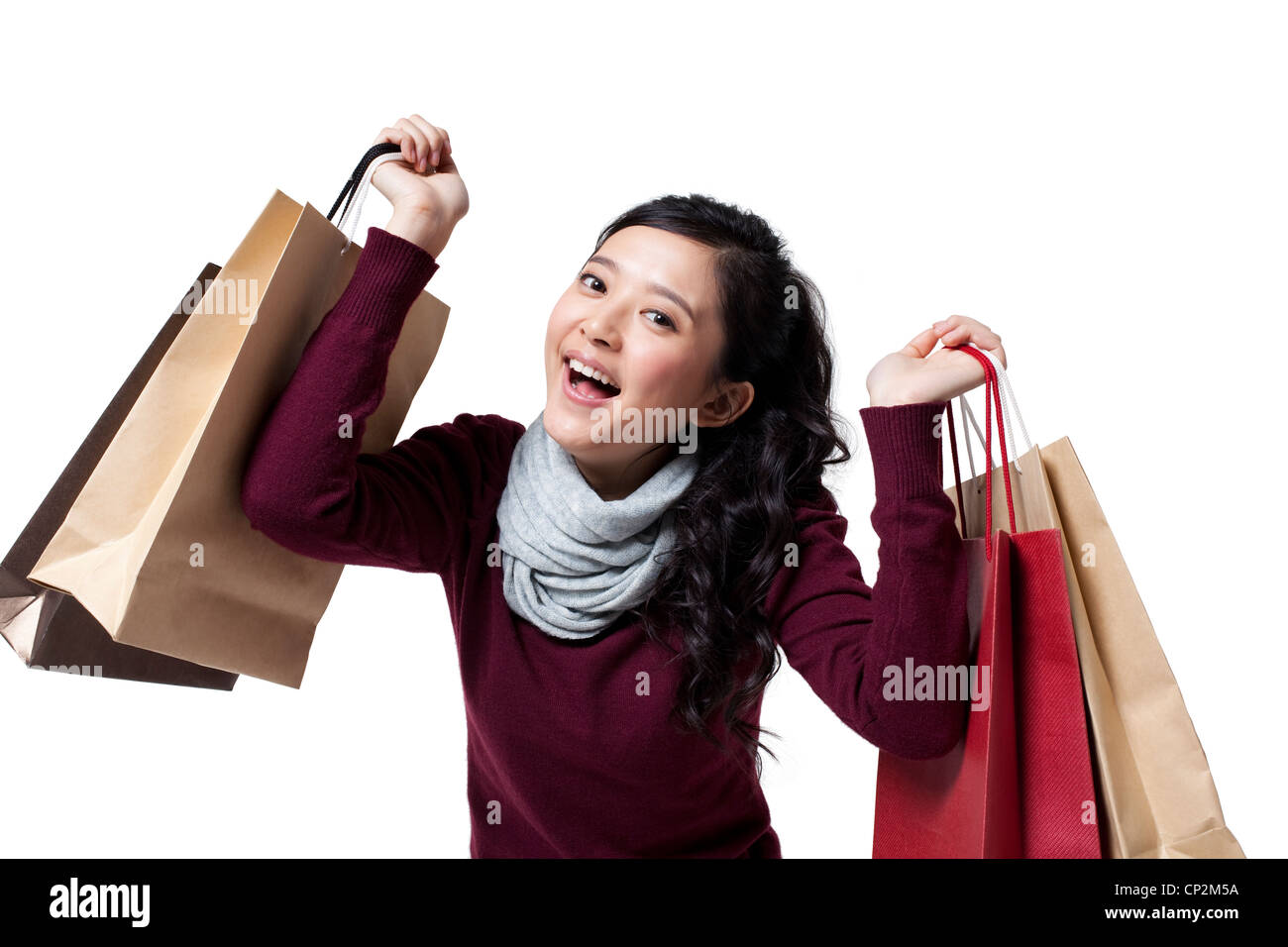 Stylish young woman going shopping Stock Photo - Alamy
