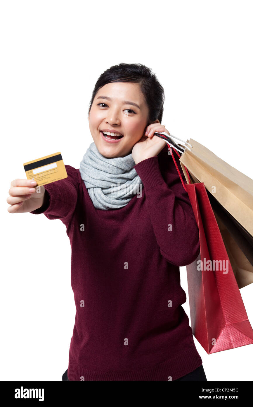 Stylish young woman going shopping Stock Photo - Alamy