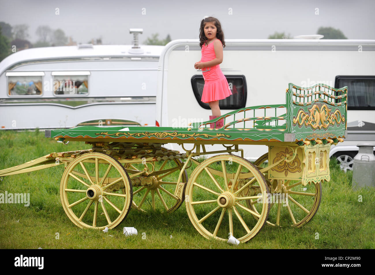 A girl stands upon a decorative trailer at the Stow-on-the-Wold horse ...