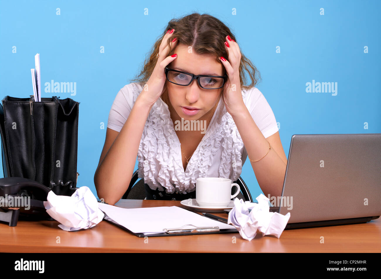 Overworked businesswoman in the office workplace Stock Photo - Alamy