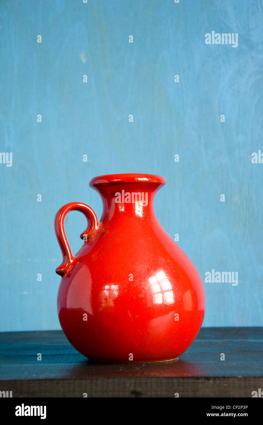 red elegant jug and windows reflections Stock Photo - Alamy