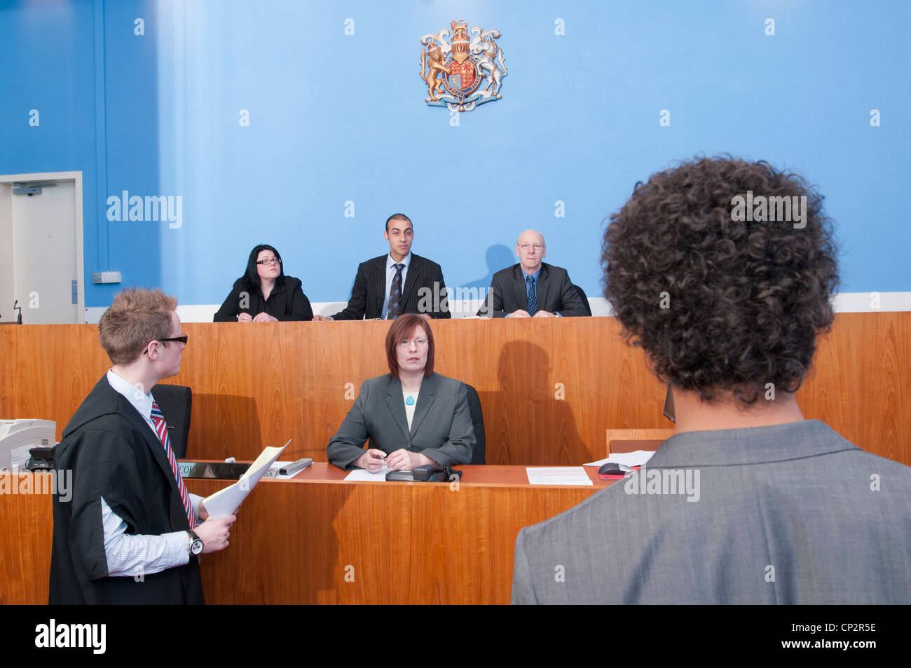 A witness in the dock in a magistrates court Stock Photo - Alamy