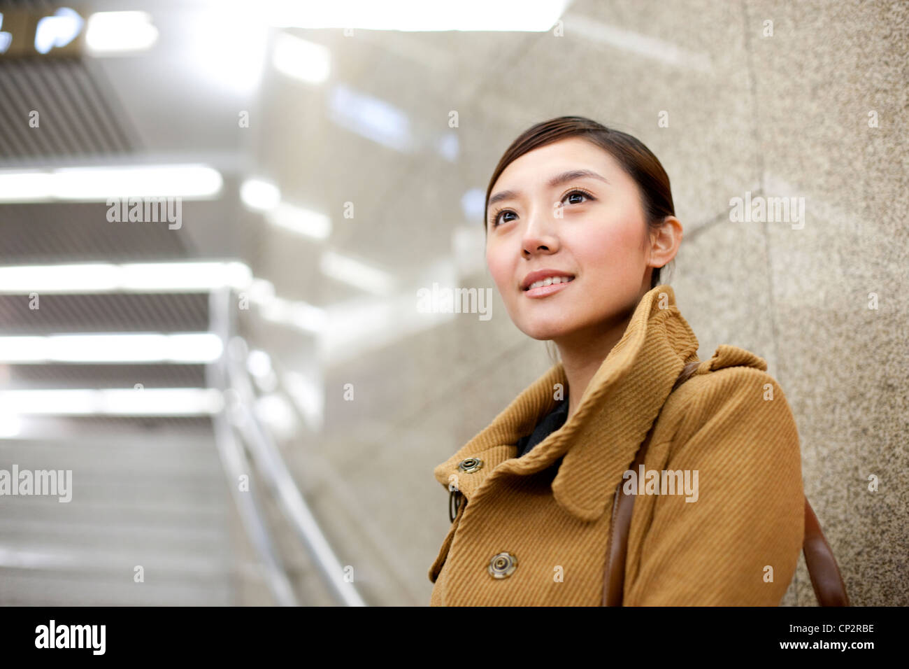 Young Chinese woman in subway station Stock Photo - Alamy