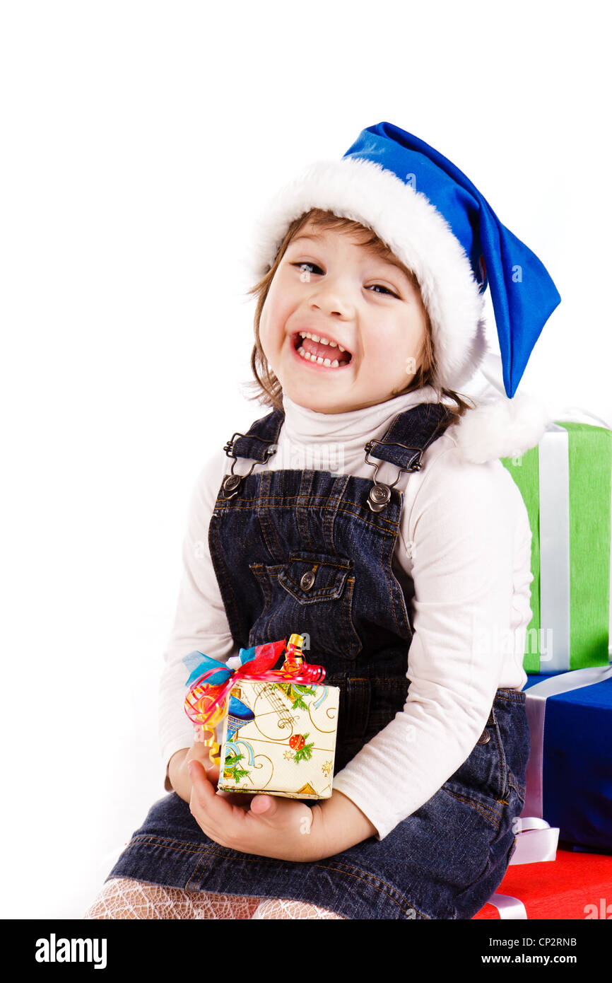 Beautiful little girl with presents over white background Stock Photo ...