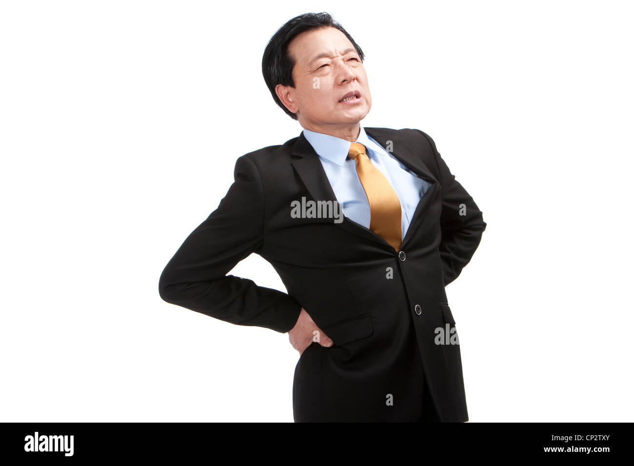 Senior businessman suffering from low back pain Stock Photo - Alamy