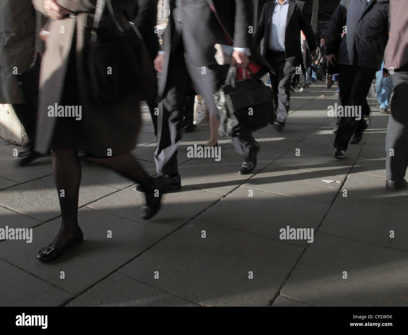 Commuters at rush hour in London Bridge, London, UK Stock Photo - Alamy