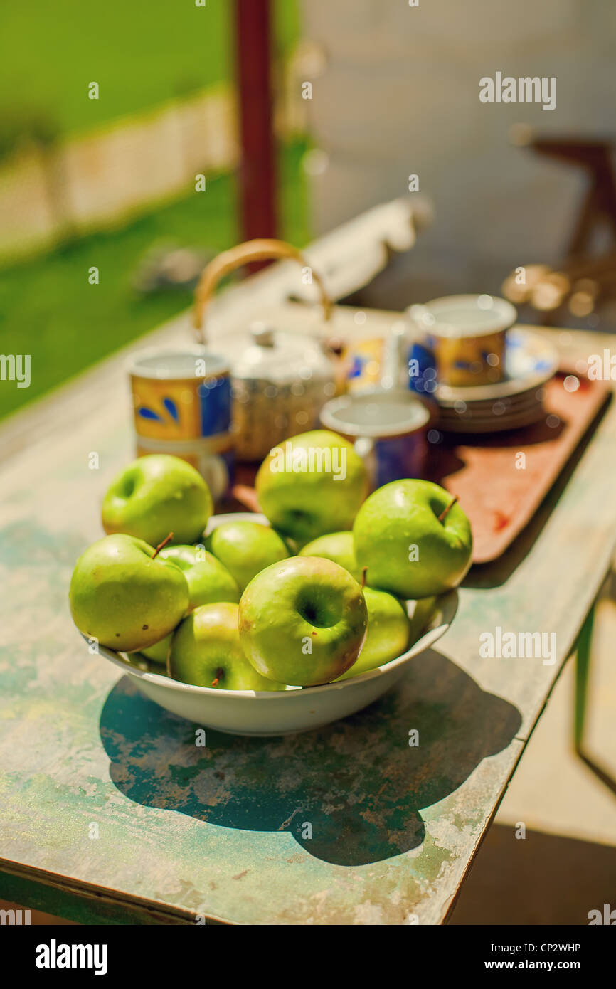 Morning Still Life with Apples and tea service Stock Photo - Alamy