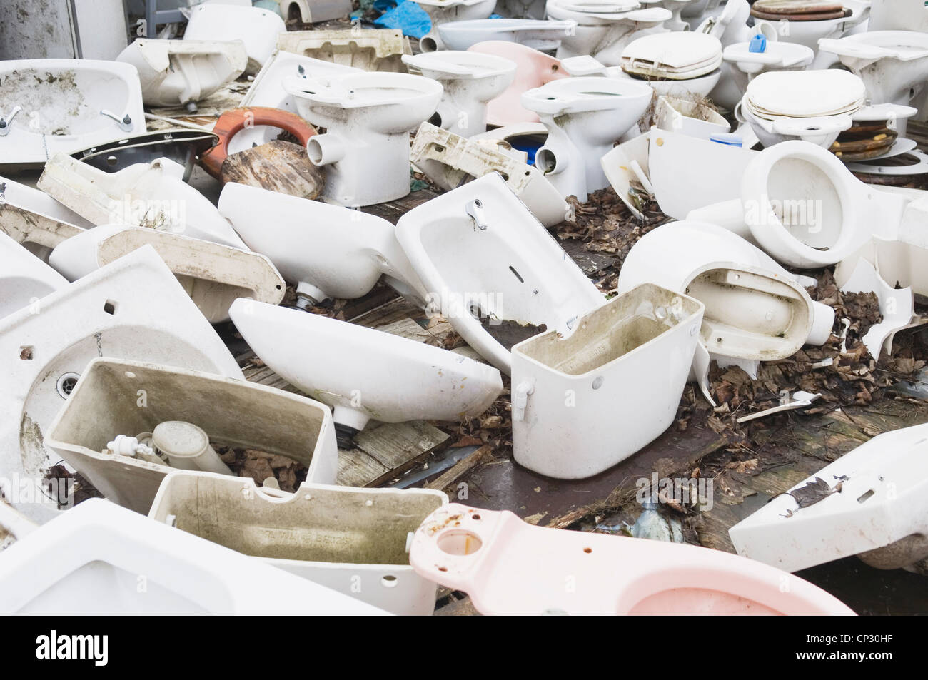 Toilets and basins in scrapyard, near Edinburgh, Scotland Stock Photo ...