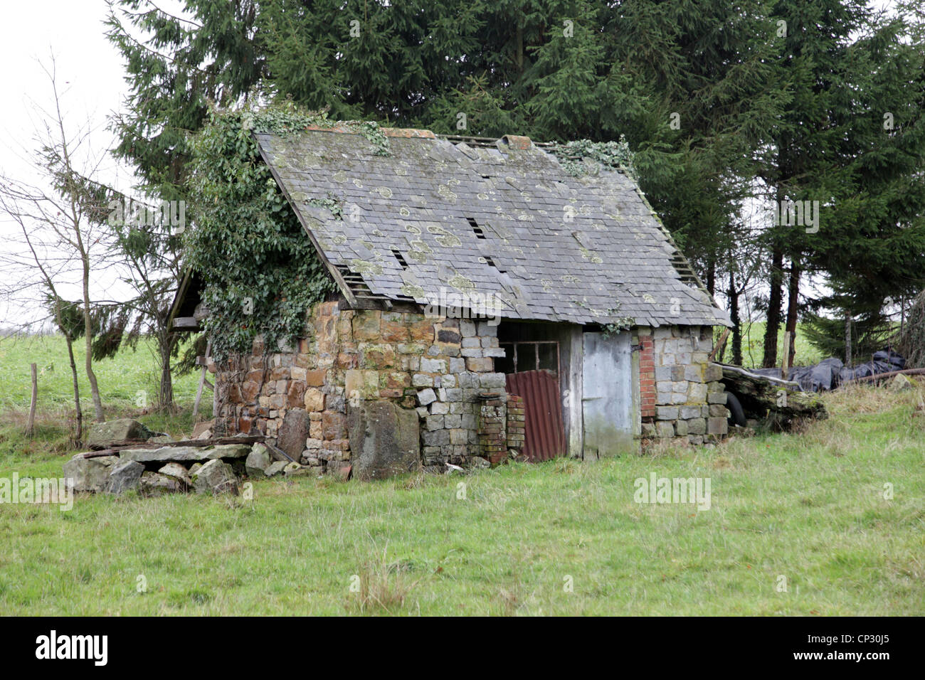 It's a photo of an old house in stone in Normandy in countryside of ...