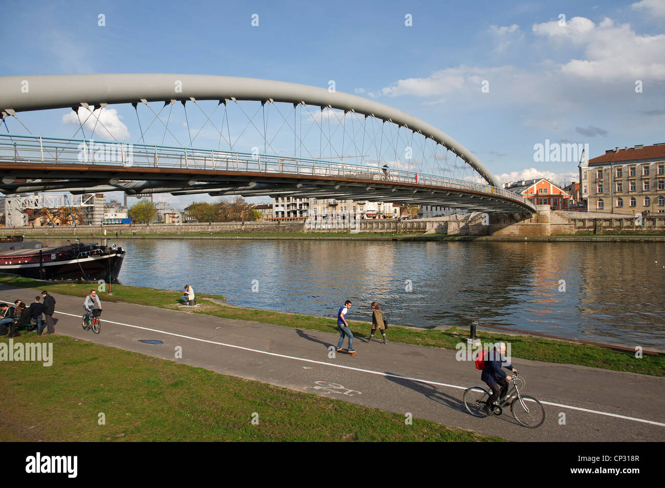 Krakow, bridge Bernatka, cyclist, river Wisla Stock Photo - Alamy