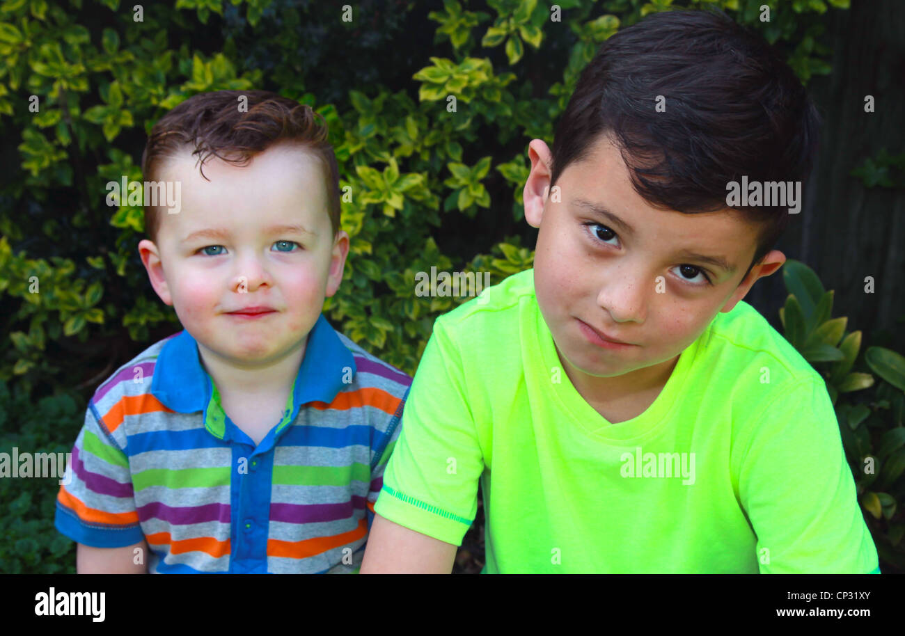 2 boys posing for the camera Stock Photo - Alamy
