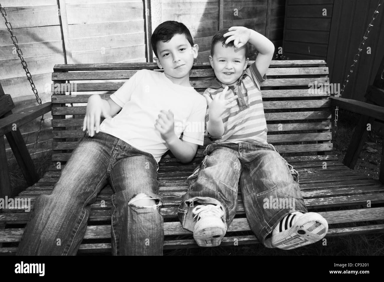 2 boys posing for the camera Stock Photo - Alamy