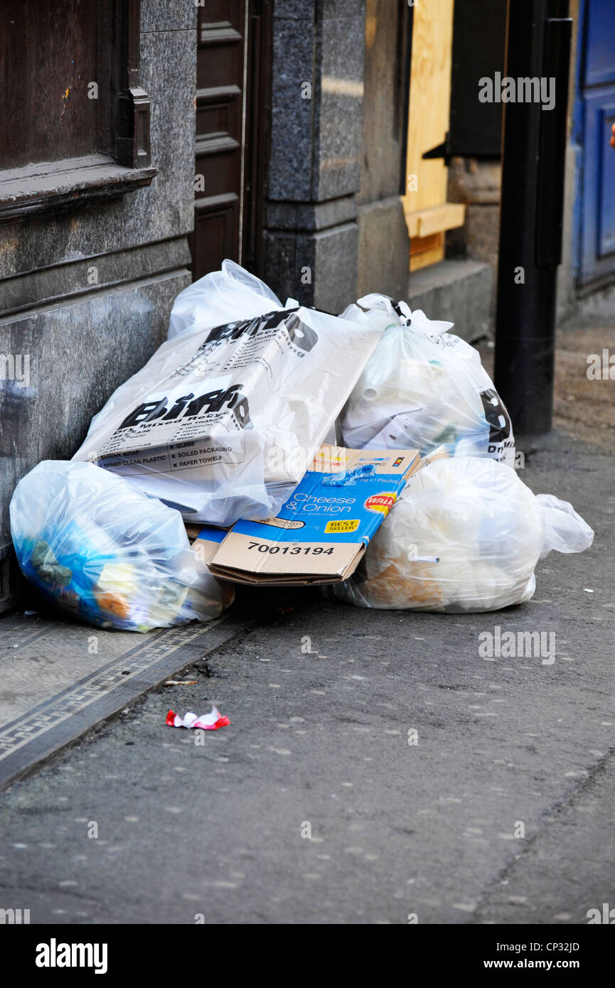 Rubbish recycling bags on street hi-res stock photography and images ...