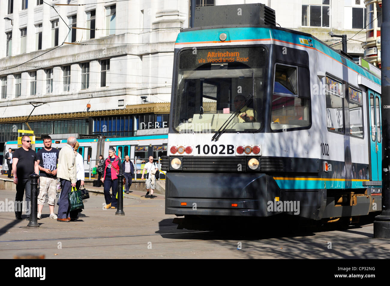 A Tram in Manchester city centre Stock Photo - Alamy