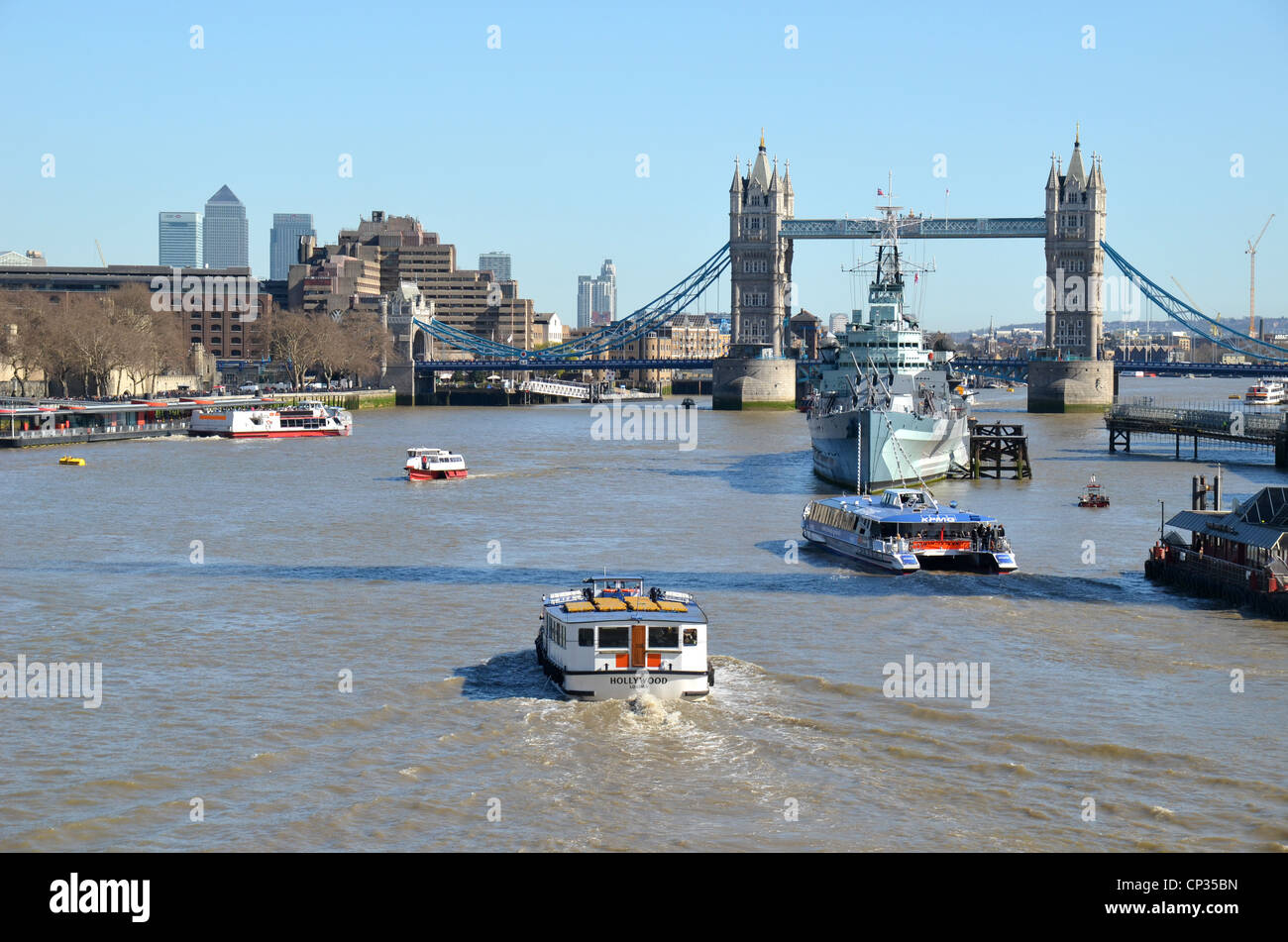 Boat moving towards Tower Bridge on the Thames Stock Photo - Alamy
