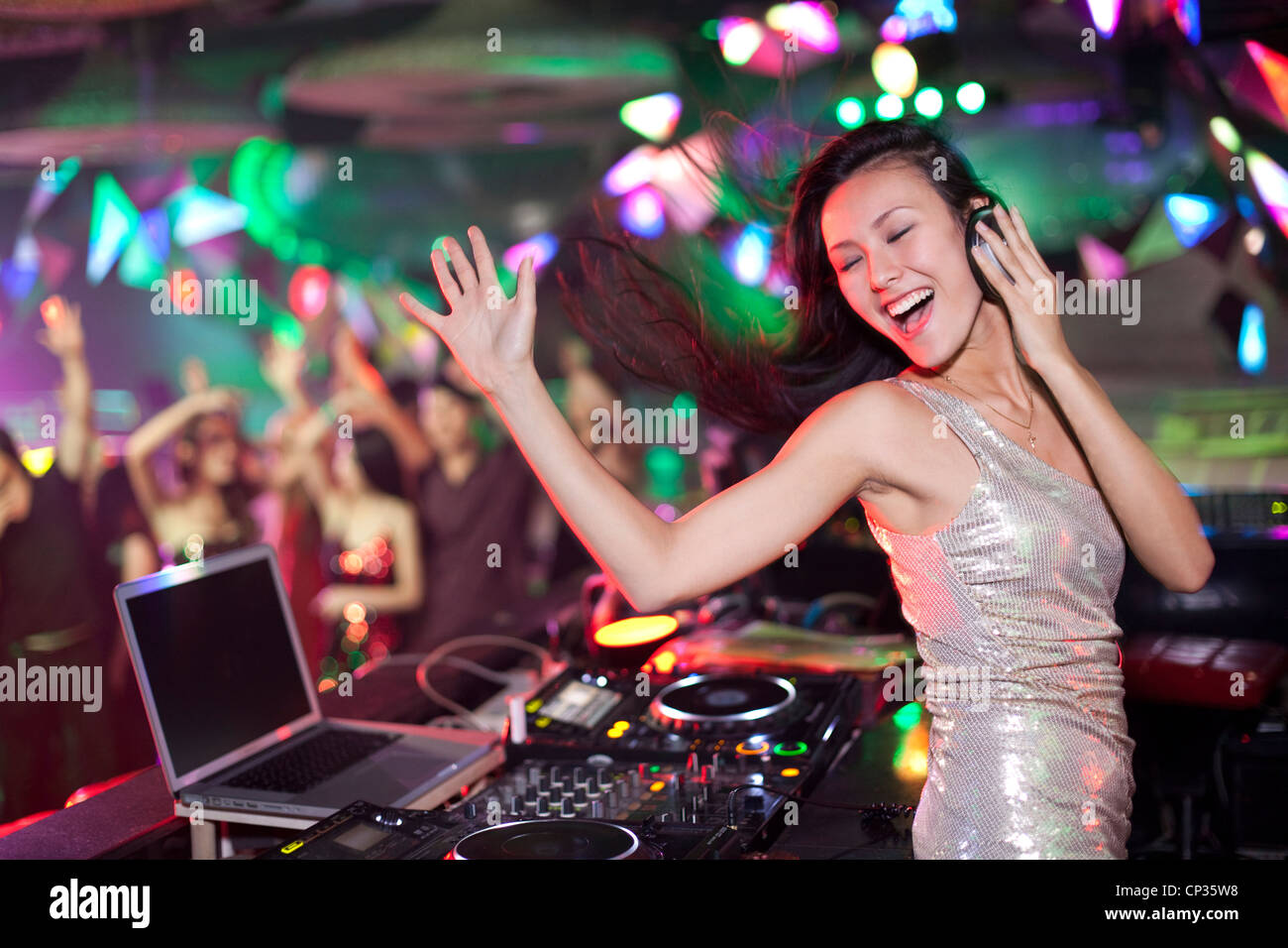 DJ in nightclub Stock Photo - Alamy