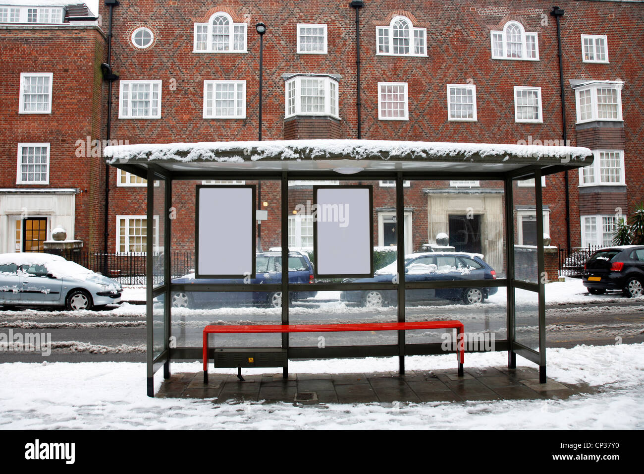 The snowy day, empty bus stop in London Stock Photo - Alamy