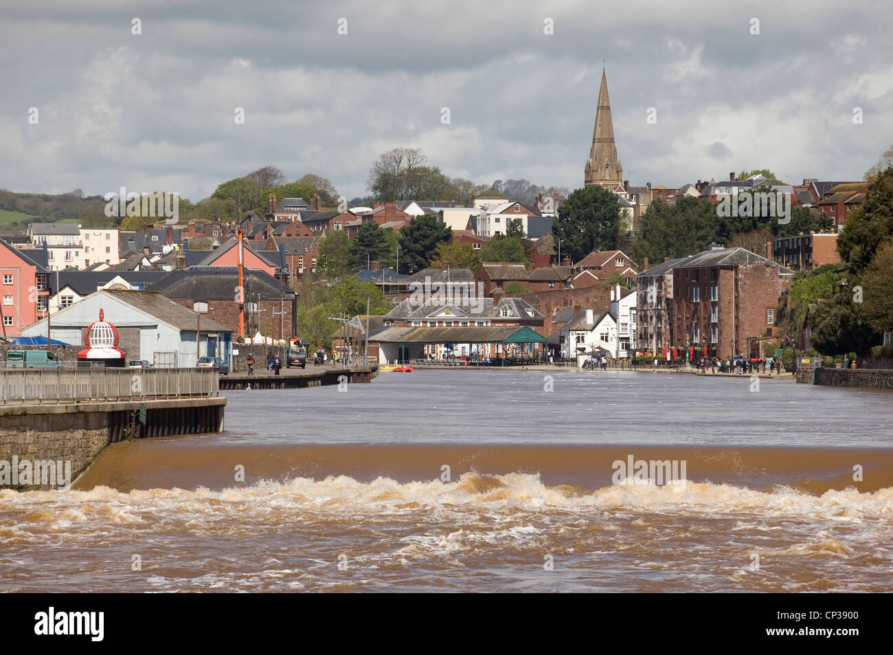 The River Exe overflowing into Exeter's flood relief and breaking the ...