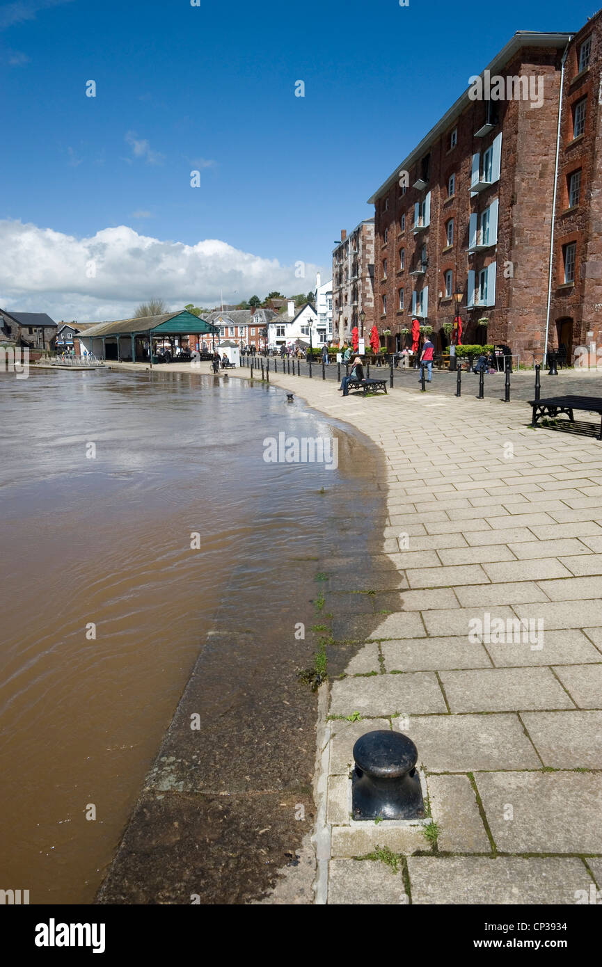 The River Exe overflowing into Exeter's flood relief and breaking the ...