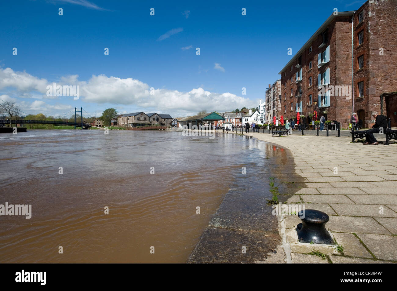 The River Exe overflowing into Exeter's flood relief and breaking the ...