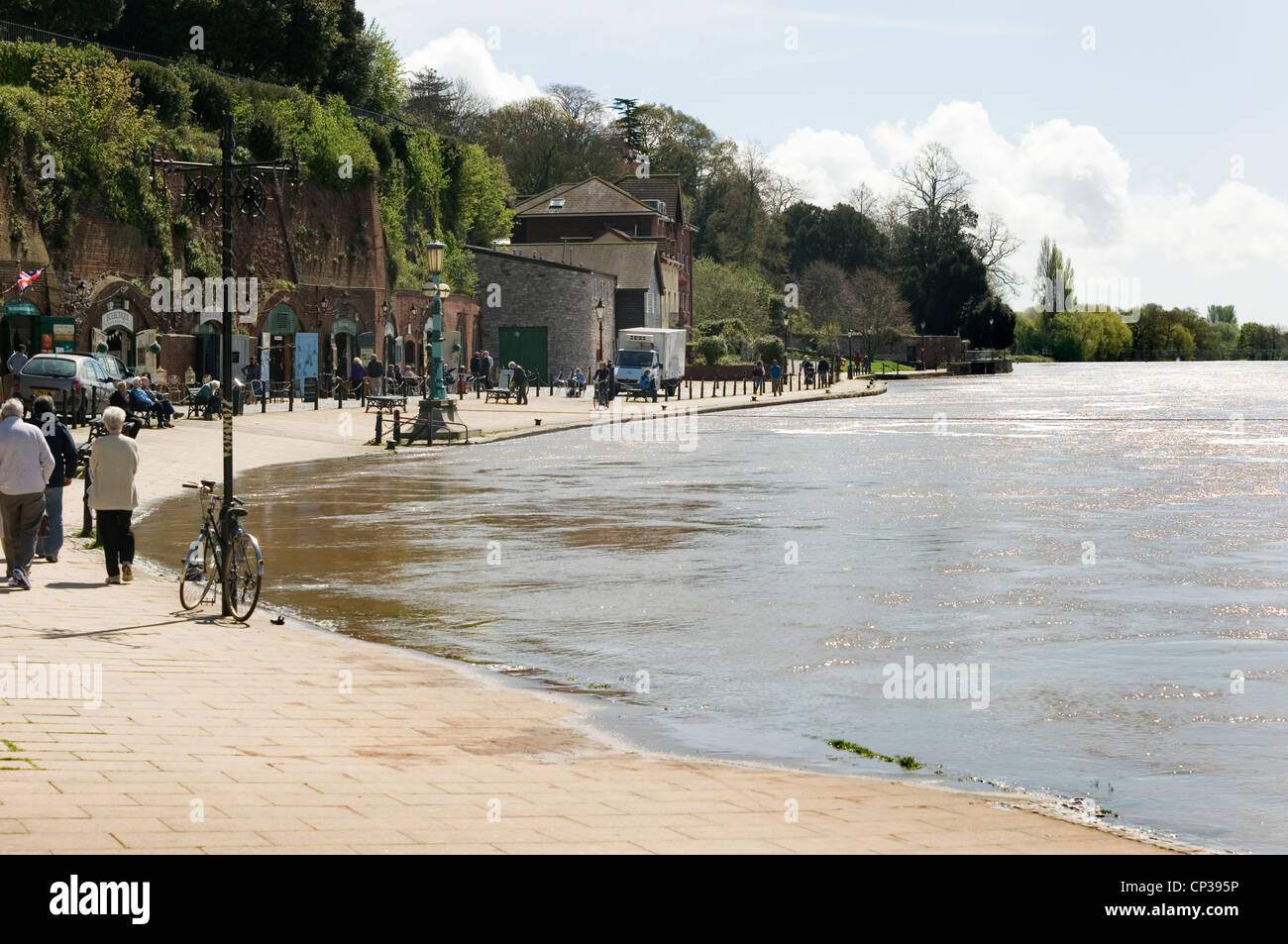 The River Exe overflowing into Exeter's flood relief and breaking the ...