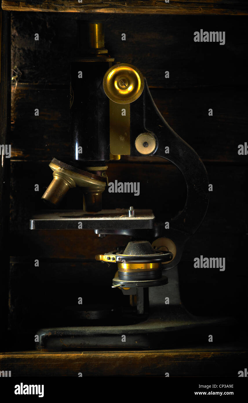 old microscope in a box Stock Photo - Alamy