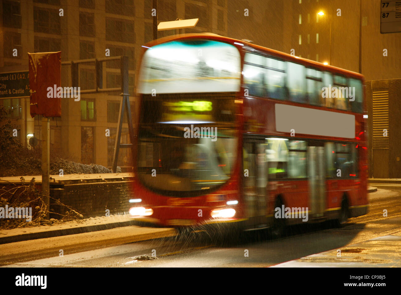 Double Decker Bus in snow storm in London Stock Photo - Alamy