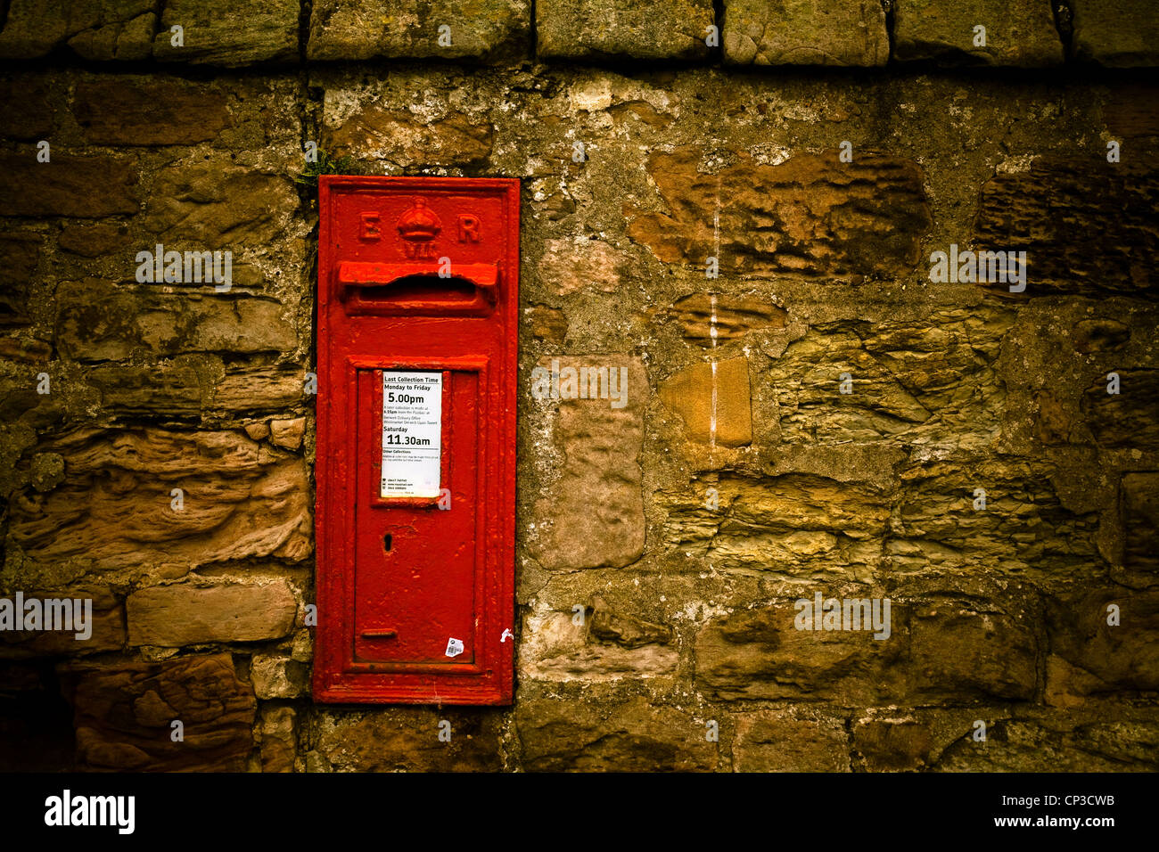 Red Letterbox in wall Stock Photo - Alamy