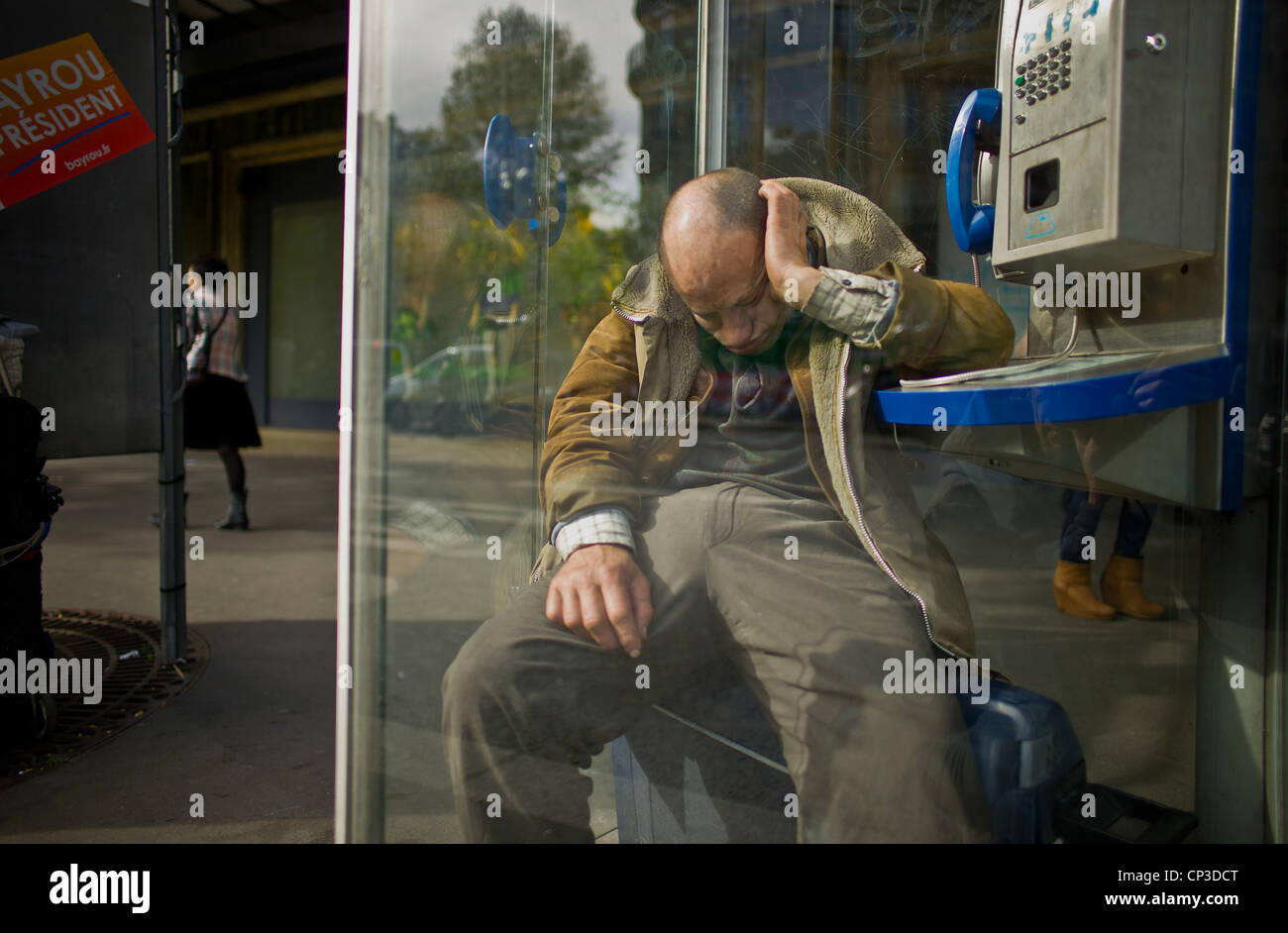 Urban poverty, , The telephone booth of the old. This very moving old ...