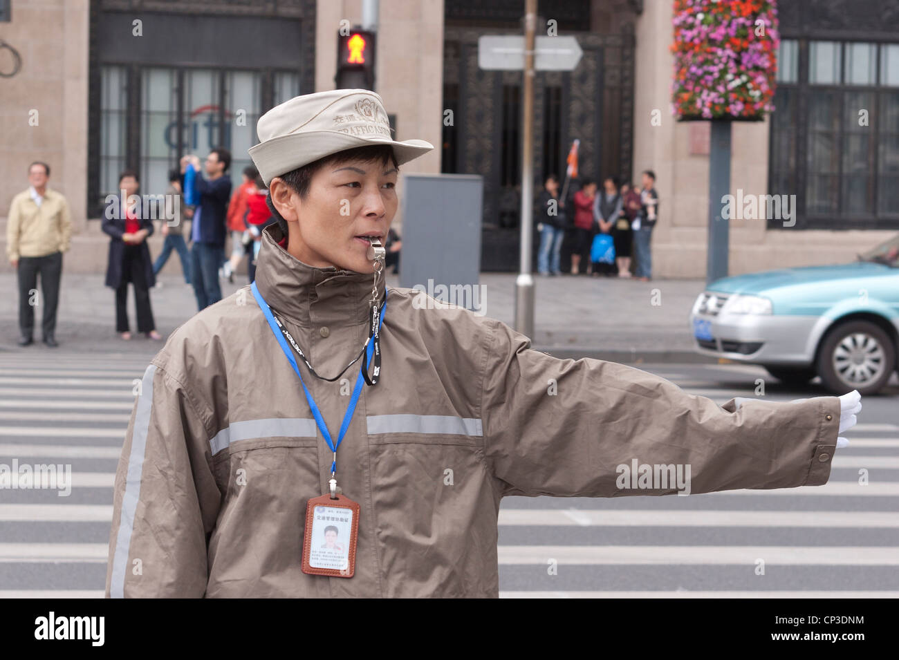 Traffic assistant, by pedestrian crossing, the Bund (Zhongshan Dongyi ...