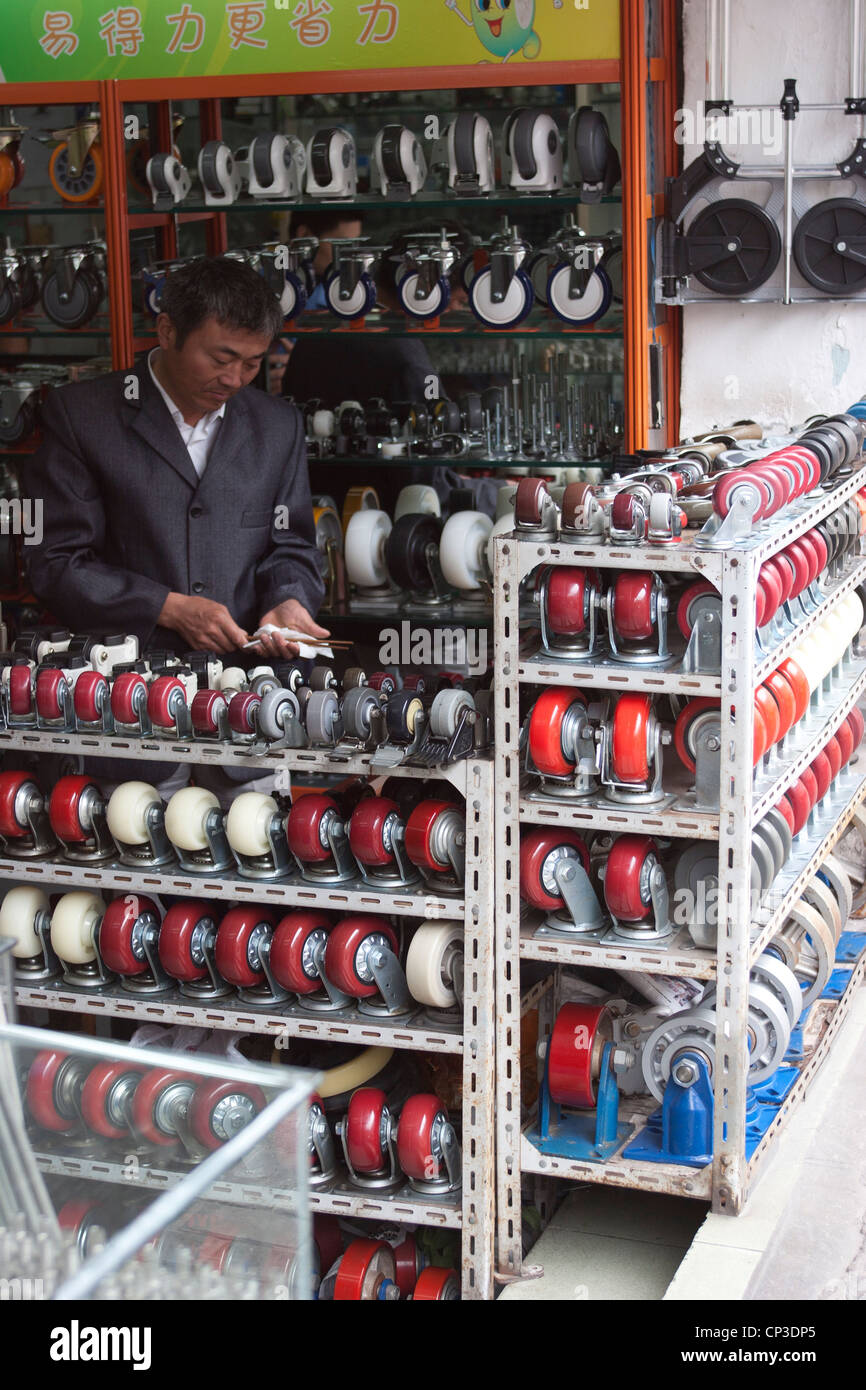 Wheels upon wheels. Wheel shop in Shanghai, China Stock Photo - Alamy
