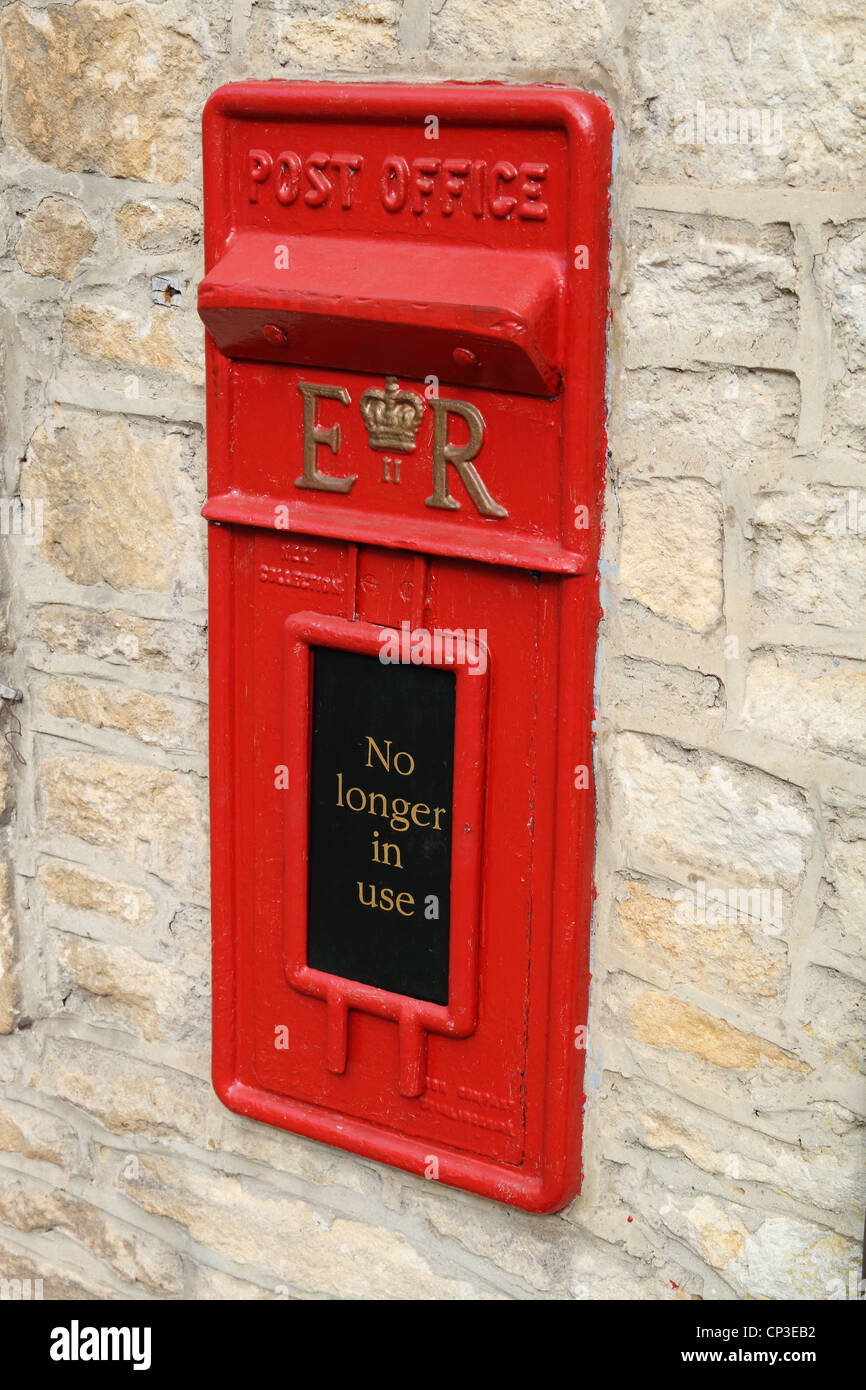Wall post box no longer in use Stock Photo - Alamy
