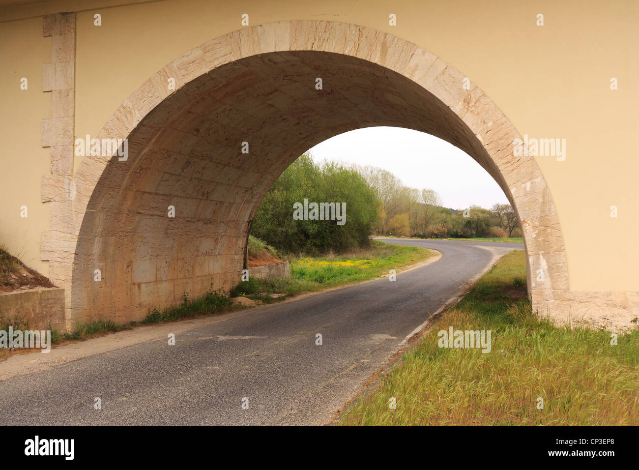 Man made road tunnel against woods and cloudy sky Stock Photo - Alamy