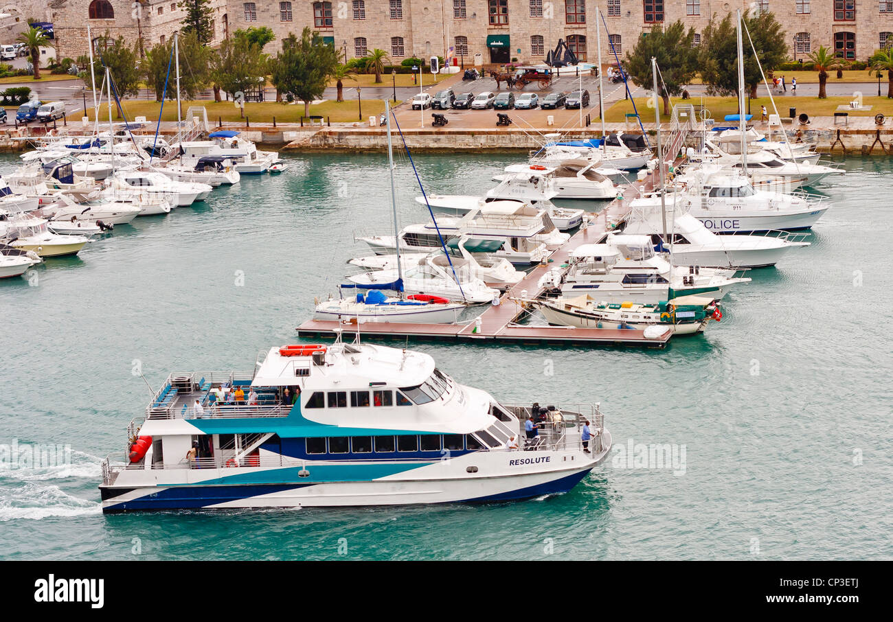 A Bermuda ferry pulling into harbor at Naval Dockyard Stock Photo - Alamy