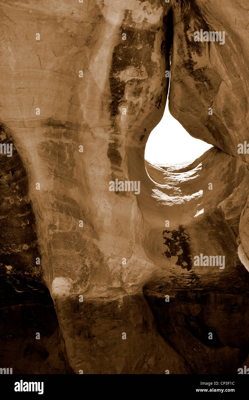 Hole in rock formation Stock Photo - Alamy