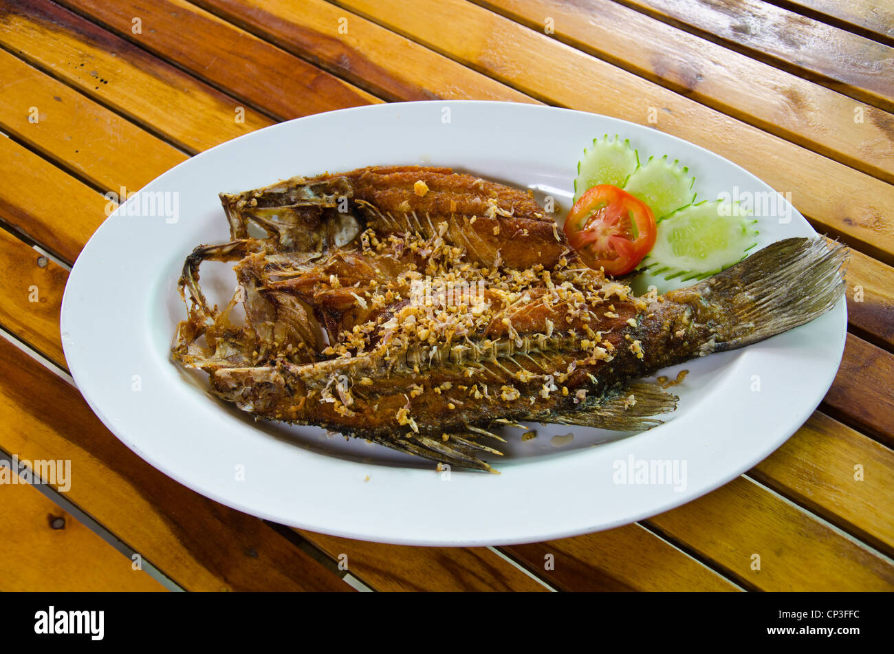 Fried red snapper Delicious Thai food Stock Photo - Alamy