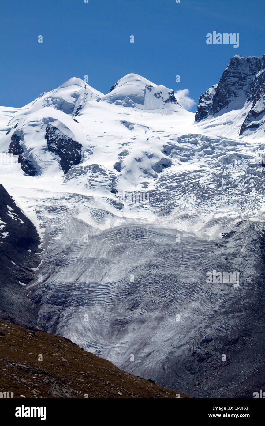 Castor and Pollux, two 4000m peaks in the Swiss Alps, rise above the ...
