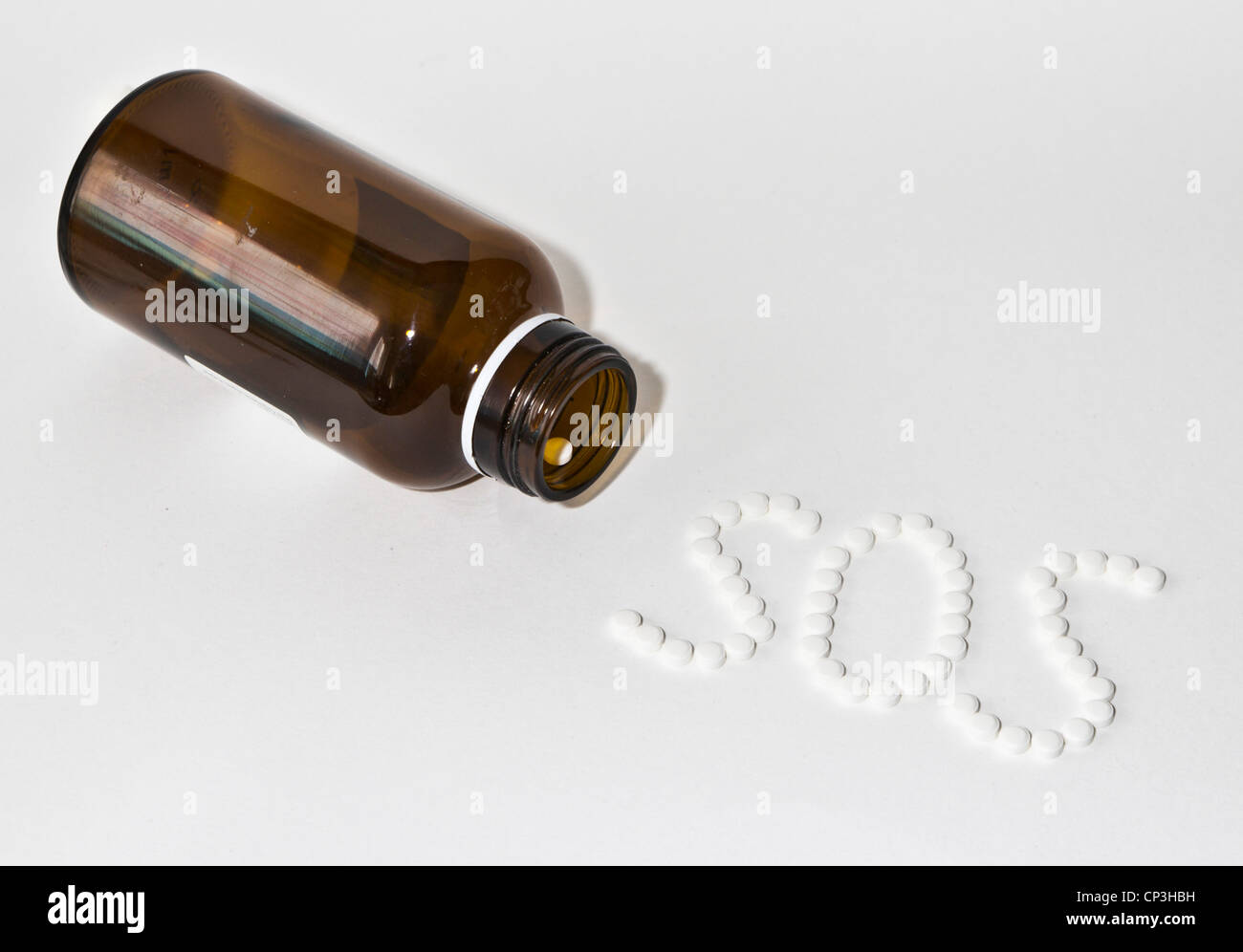 medicine bottle with word sos Stock Photo - Alamy