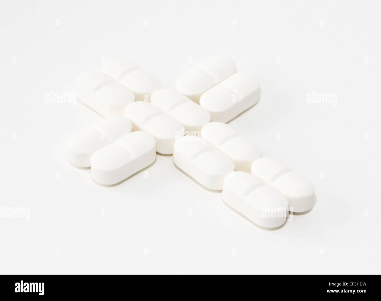 cross made of pills Stock Photo - Alamy