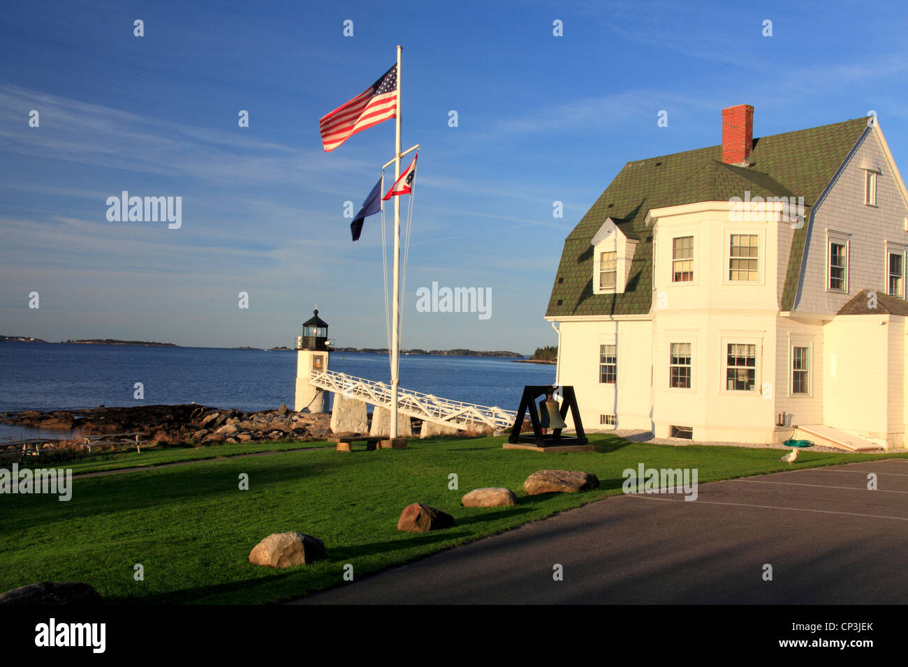 Photo of the Marshall Point Lighthouse, Museum, and pier at sunrise ...