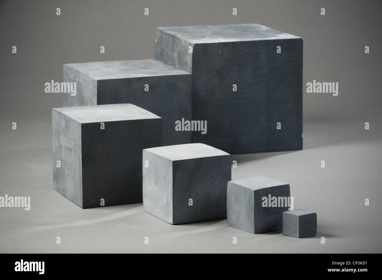 Stone blocks organized from largest to smallest Stock Photo - Alamy