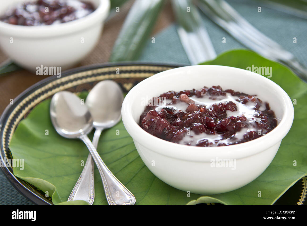 Black sticky rice with coconut milk Thai dessert Stock Photo - Alamy