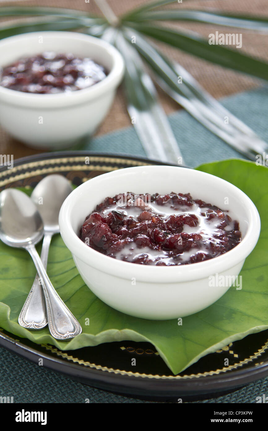 Black sticky rice with coconut milk Thai dessert Stock Photo - Alamy