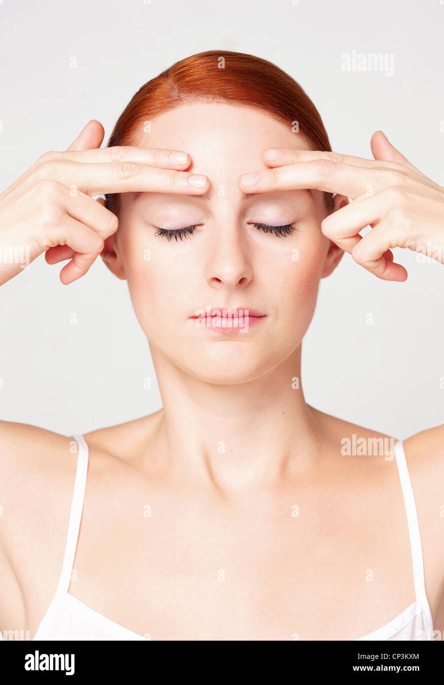 Finger acupressure forehead hi-res stock photography and images - Alamy