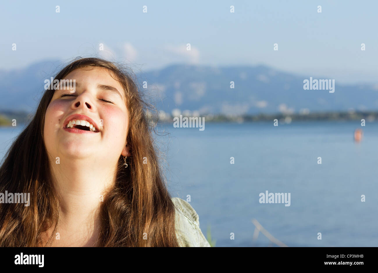 Portrait smiling woman eyes closed relaxing on the beach hi-res stock ...